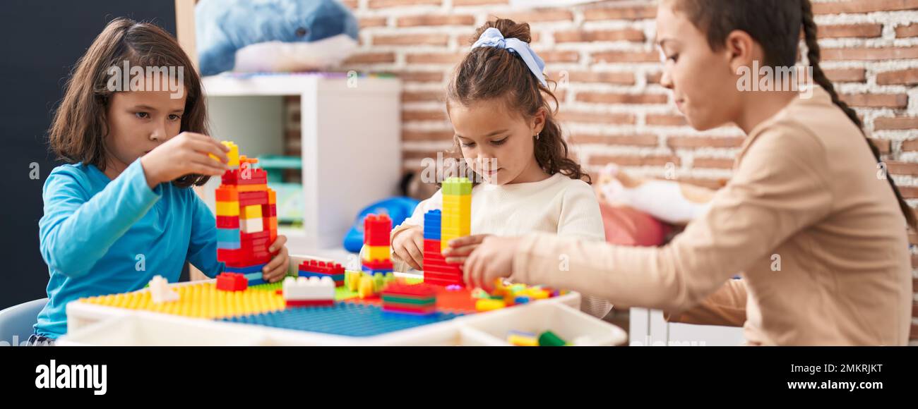 Group kids playing construction blocks hi-res stock photography and ...