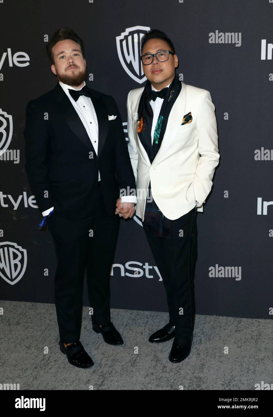 Zeke Smith, left, and Nico Santos arrive at the InStyle and Warner Bros ...