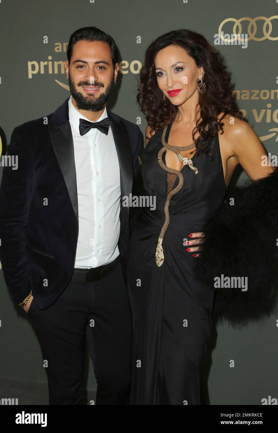 Fabio Toscano, left, and Sofia Milos arrive at the Amazon Golden Globes ...