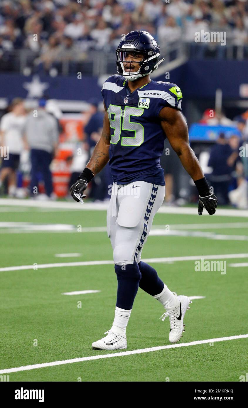 Seattle Seahawks defensive end Dion Jordan (95) walks off the field ...