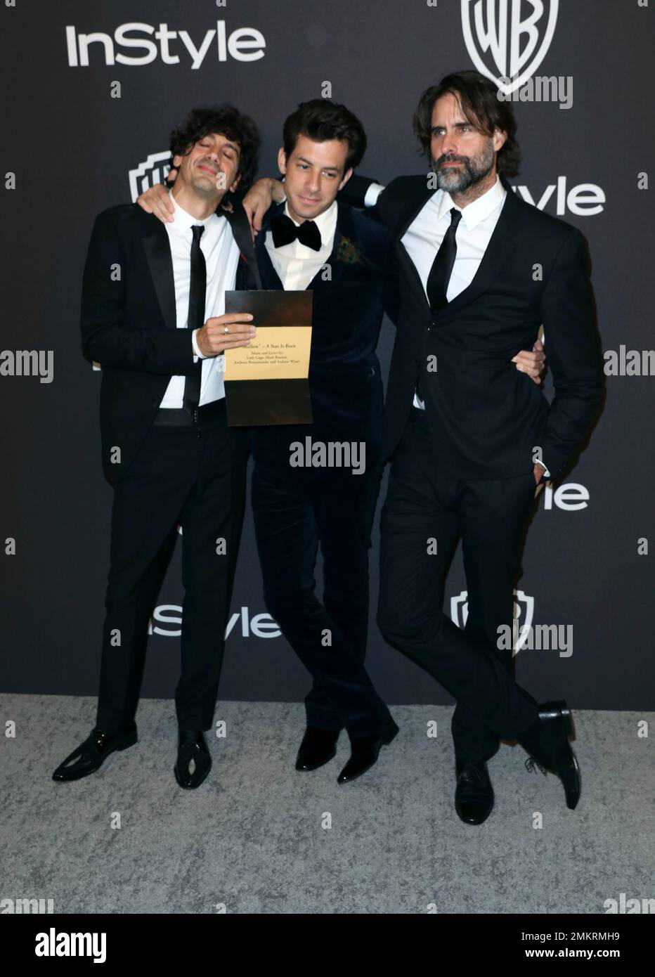 Anthony Rossomando, from left, Mark Ronson and Andrew Wyatt, winner of ...