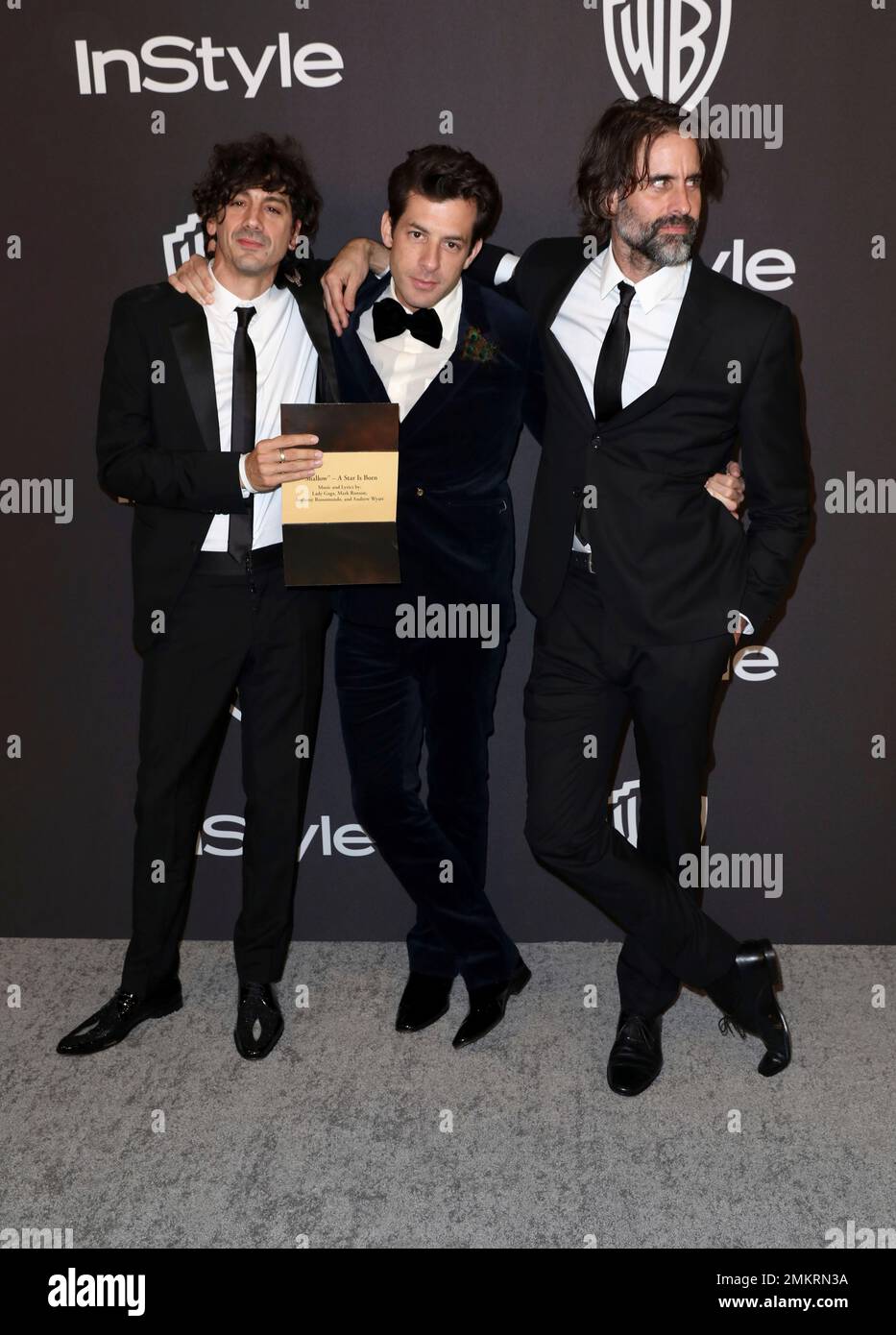 Anthony Rossomando, from left, Mark Ronson and Andrew Wyatt, winner of ...