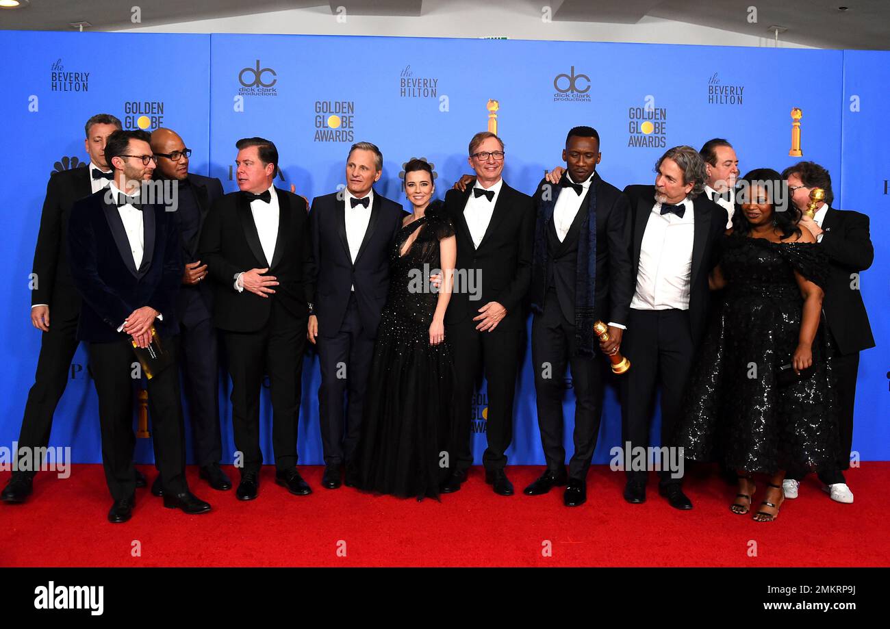 The cast and crew of "Green Book" pose in the press room with the award ...