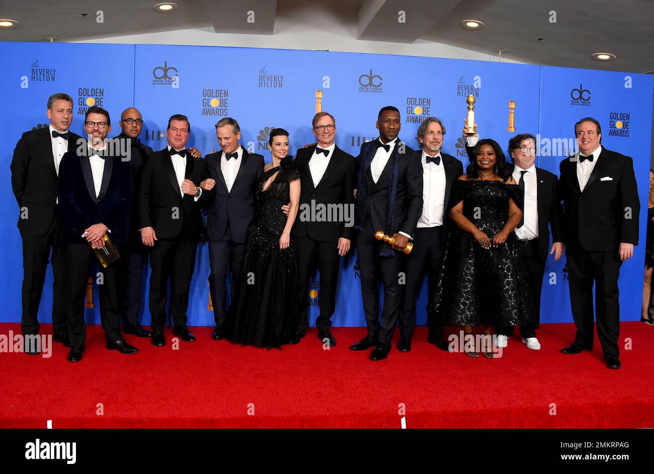 The cast and crew of "Green Book" pose in the press room with the award ...