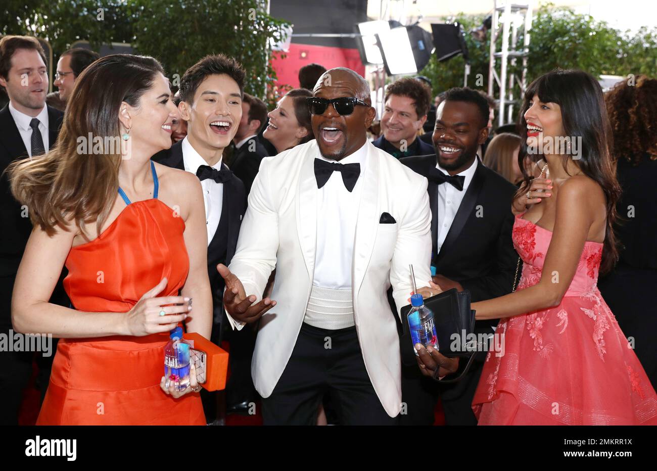 IMAGE DISTRIBUTED FOR FIJI WATER - D'Arcy Carden, from left, Manny ...