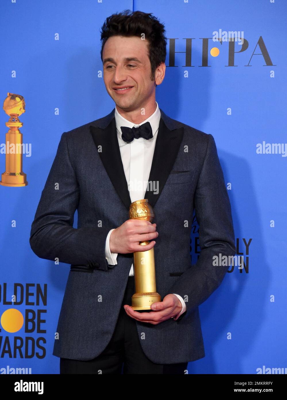 Justin Hurwitz poses in the press room with the award for best original ...