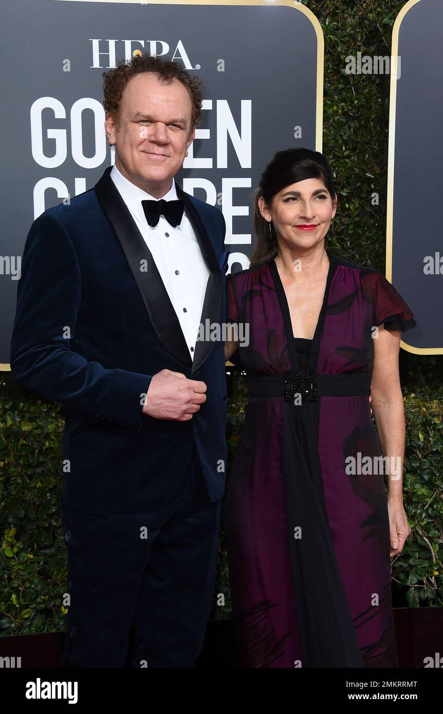 John C. Reilly, left, and Alison Dickey arrive at the 76th annual ...