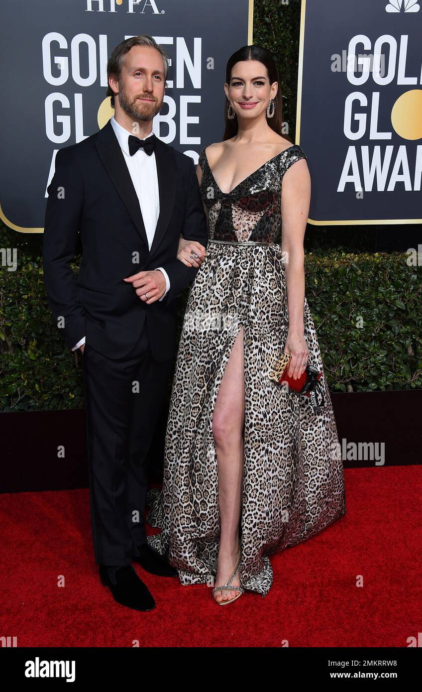 Anne Hathaway, right, and Adam Shulman arrive at the 76th annual Golden ...