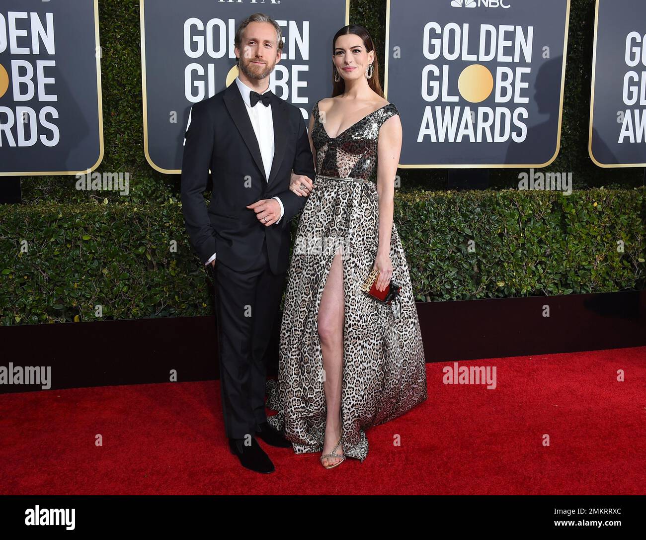 Anne Hathaway, right, and Adam Shulman arrive at the 76th annual Golden ...
