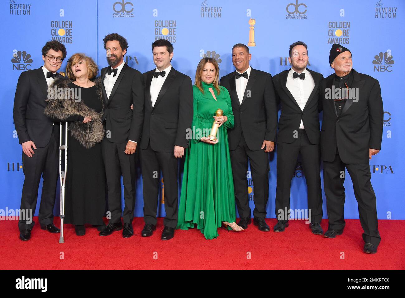 The cast and crew of "Spider-Man: Into the Spider-Verse" pose in the ...