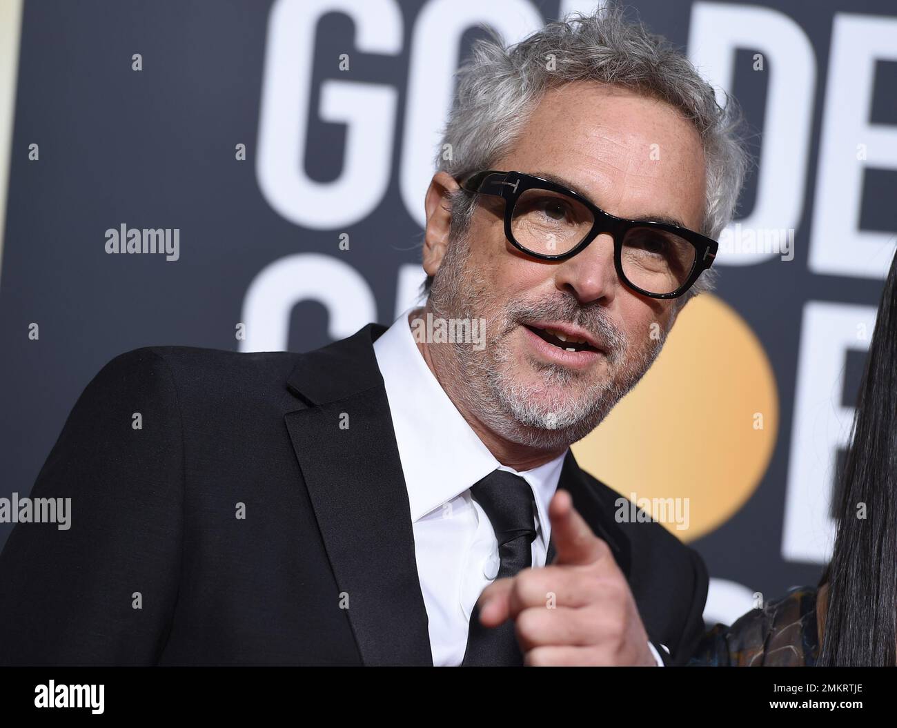 Alfonso Cuaron arrives at the 76th annual Golden Globe Awards at the ...