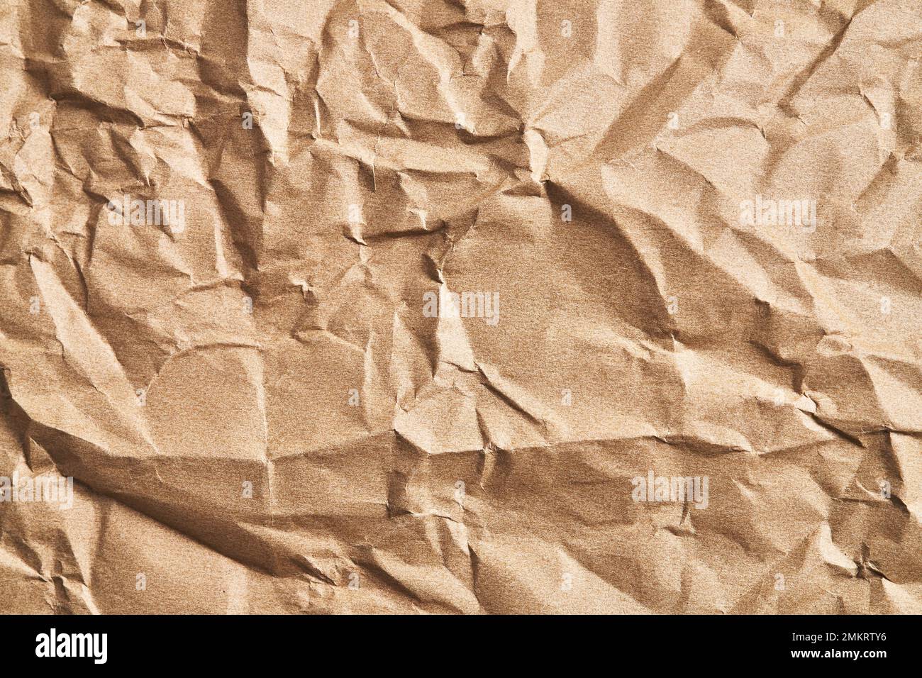 Brown crumpled paper texture background Stock Photo - Alamy