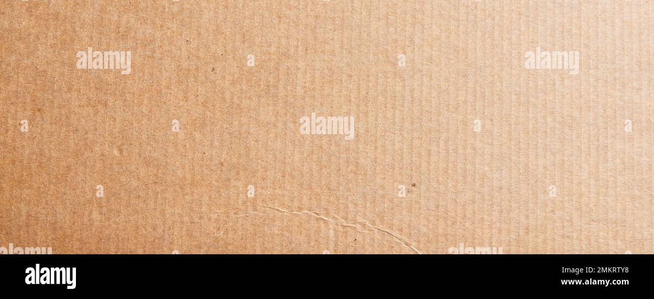 Brown cardboard carton material texture background Stock Photo - Alamy