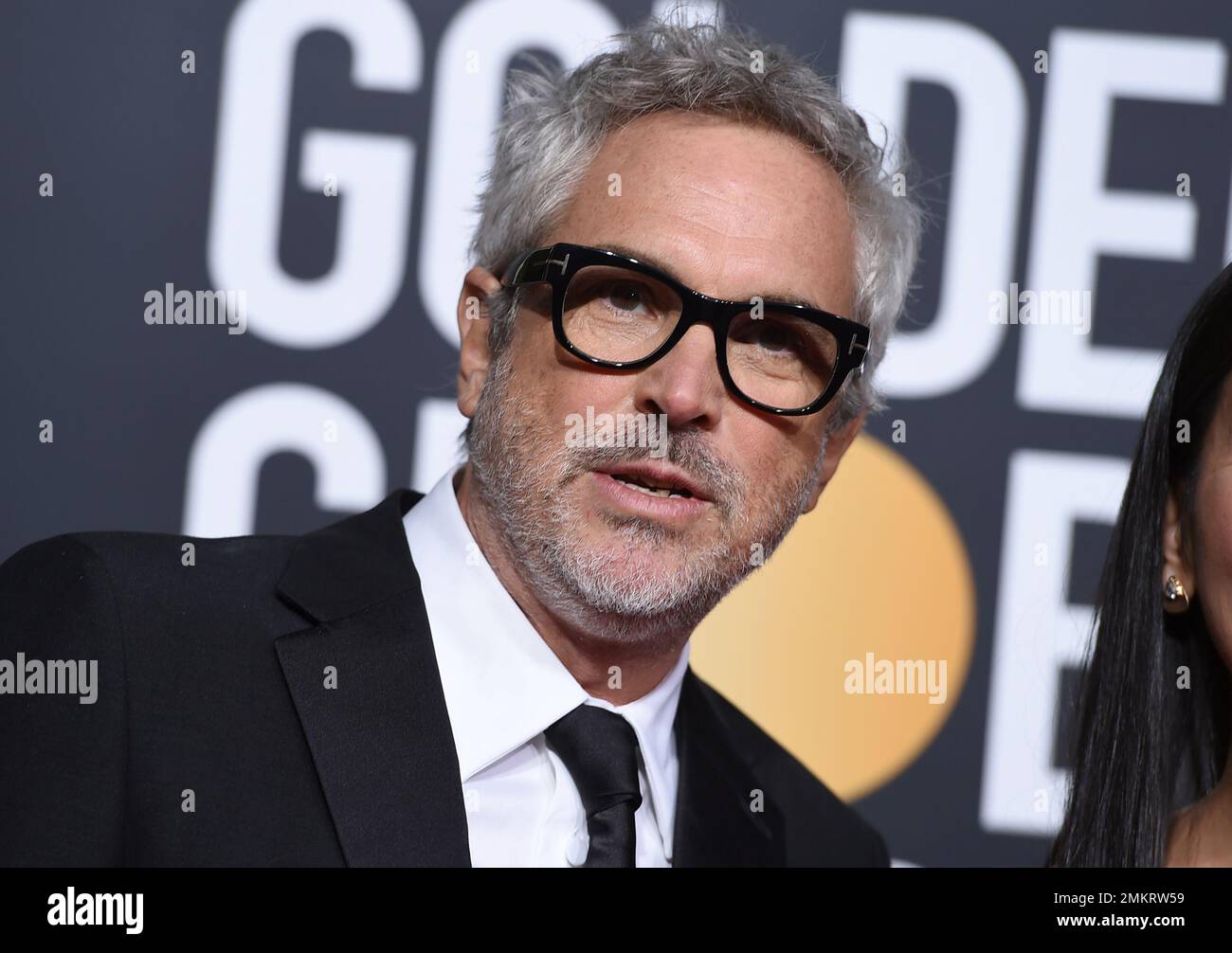 Alfonso Cuaron arrives at the 76th annual Golden Globe Awards at the ...