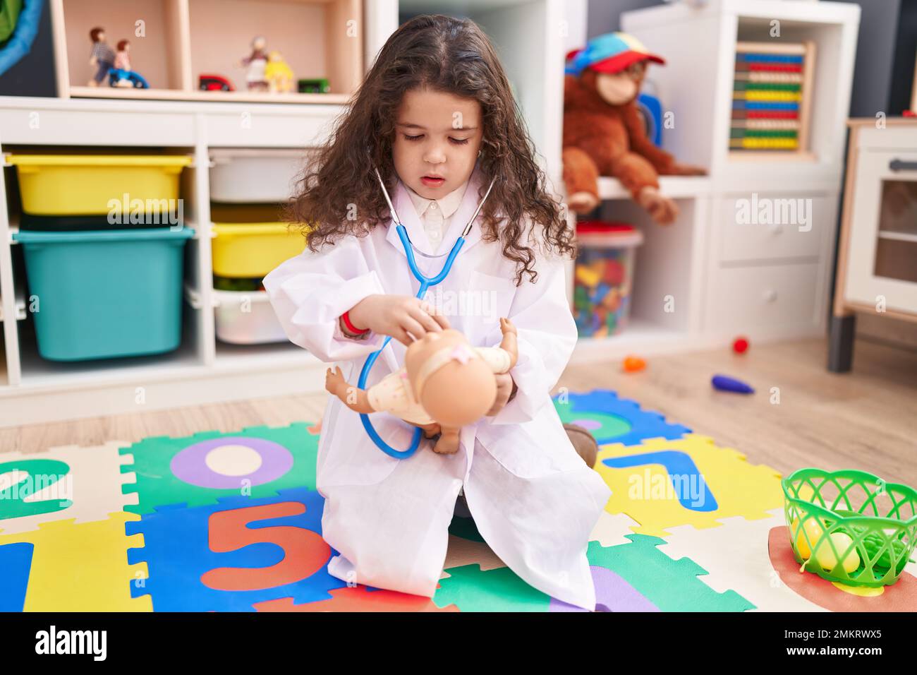 Doctor children game kindergarten hi-res stock photography and images ...