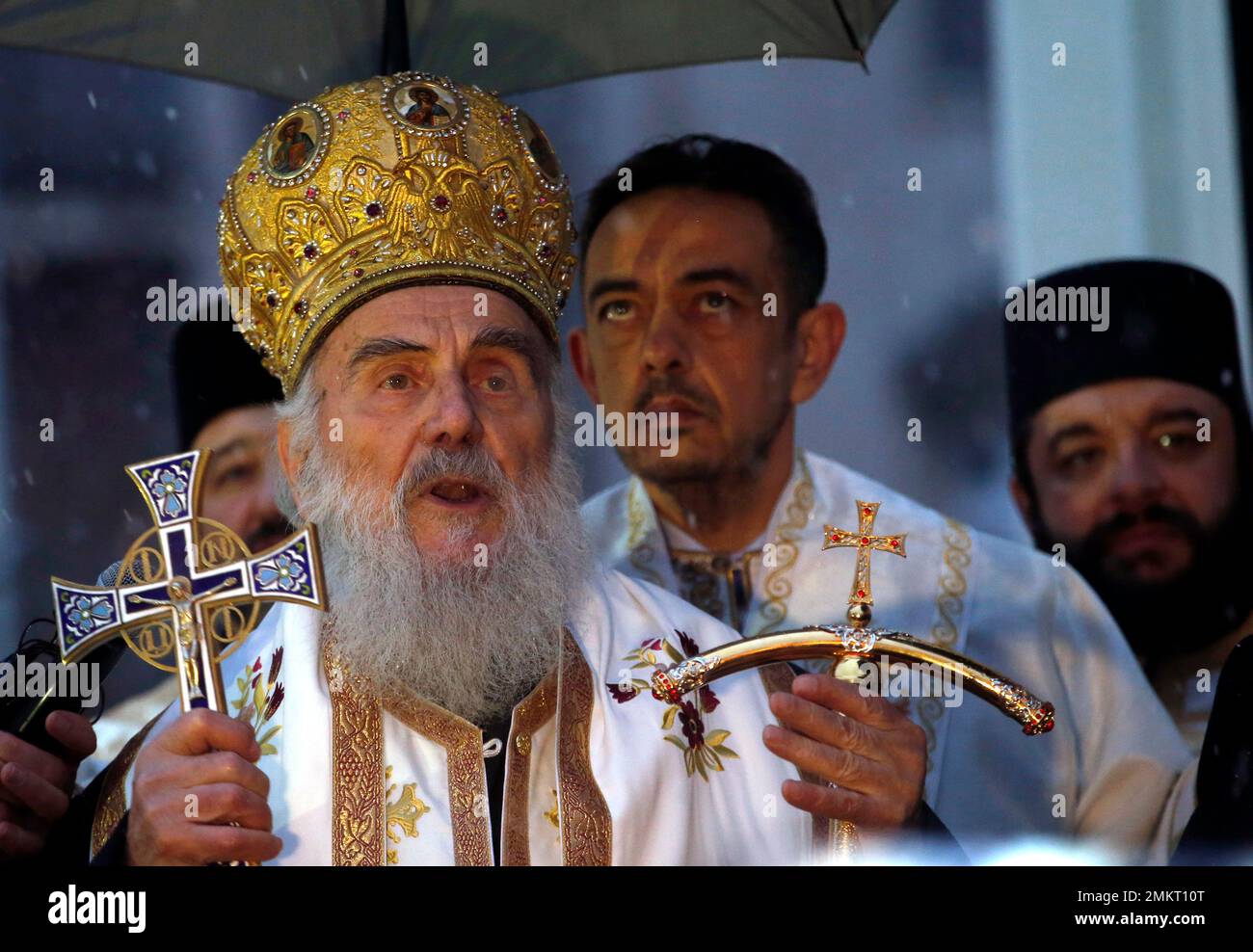 Serbian Patriarch Irinej performs during a ceremonial burning of dried ...
