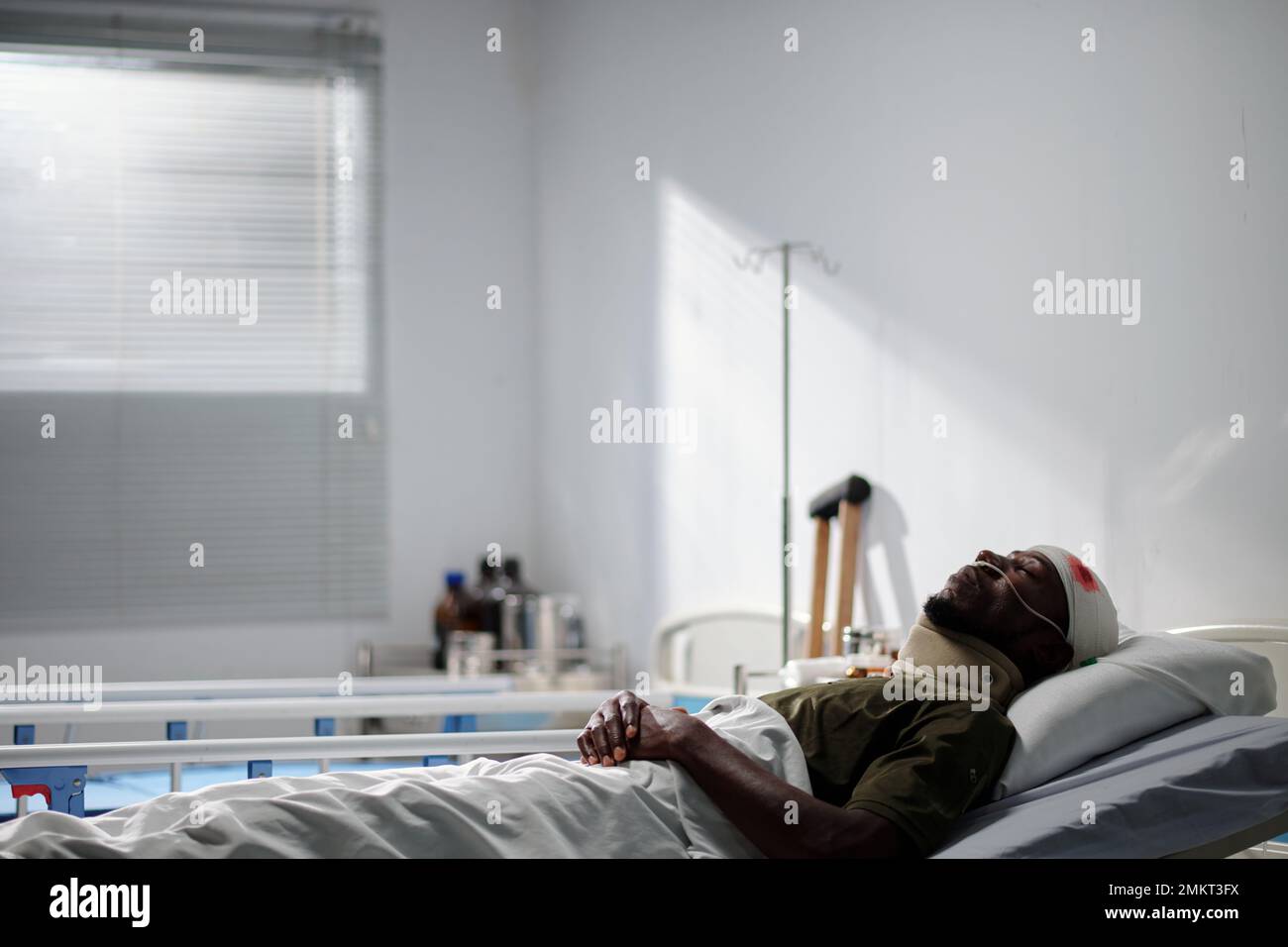 Sick military man resting in hospital ward after head surgery Stock ...