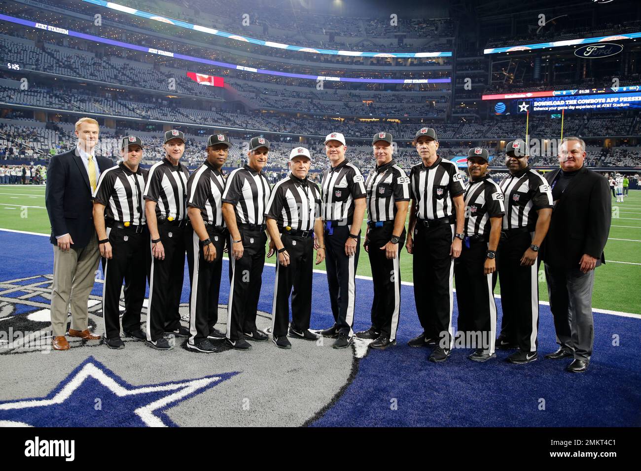 Replay Assistant Roddy Ames, from left, line judge Bart Longson (2 ...