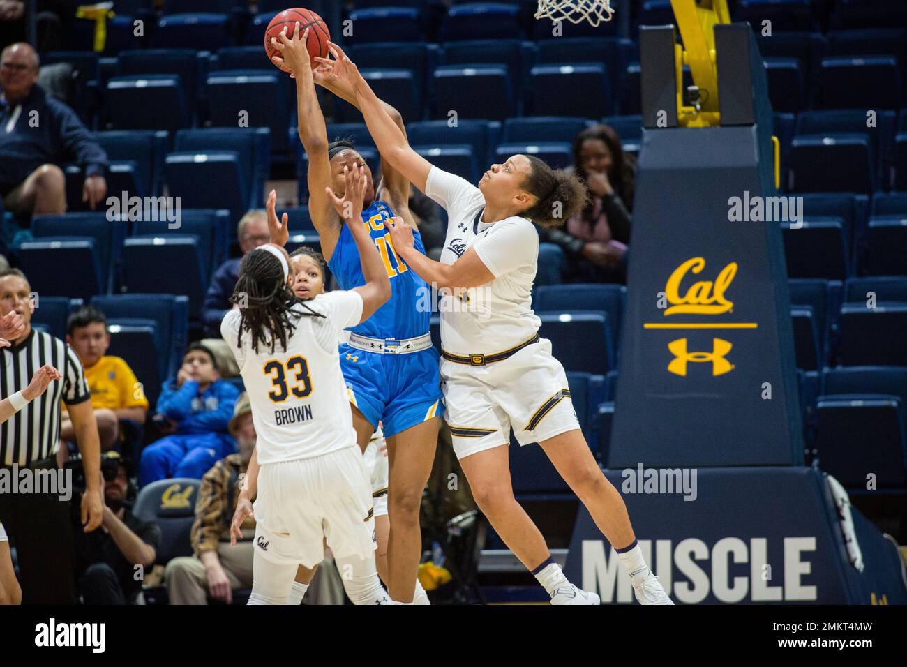 UCLA's Lajahna Drummer and Cal's McKenzie Forbes fight for a rebound ...