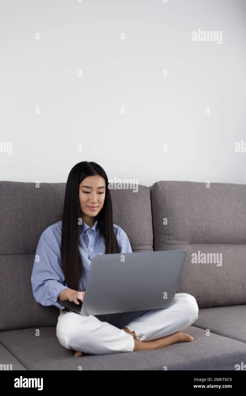 Programmer girl coding on computer at home. Young asian girl studying ...