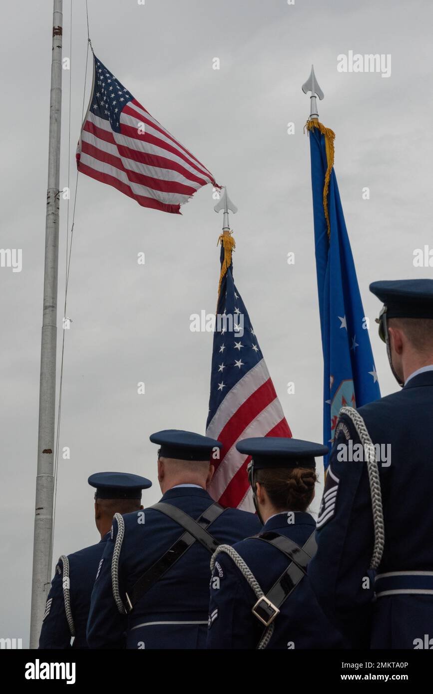 The 914th Base Honor Guard marches towards the flag pole to present the ...
