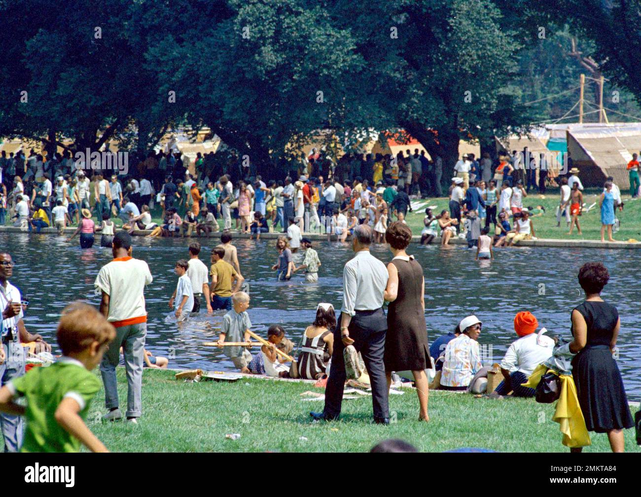 Participants of the Poor People's Campaign cool off in the Reflecting ...