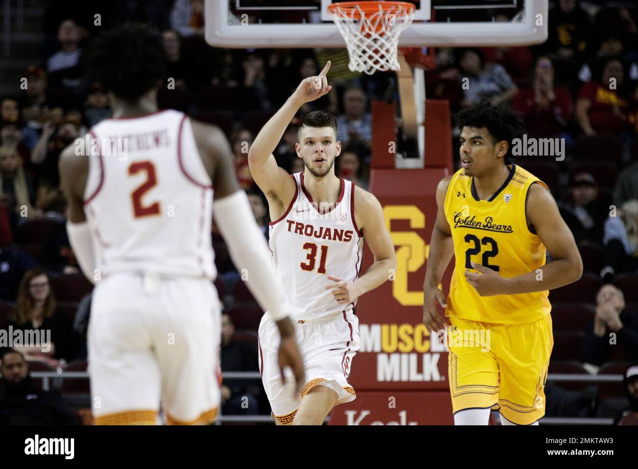 Southern California's Nick Rakocevic, center, celebrates his basket as ...
