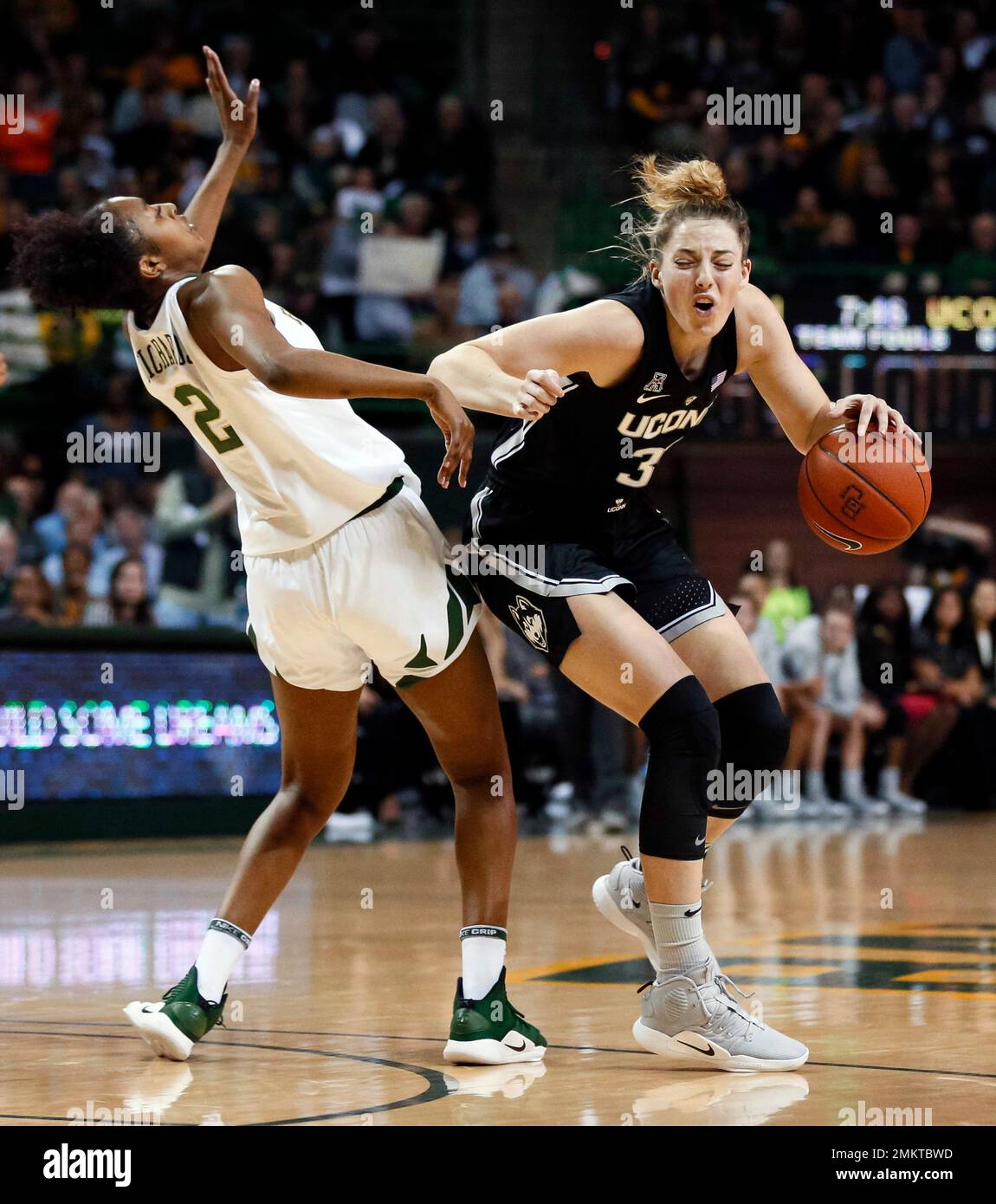 Connecticut guard/forward Katie Lou Samuelson (33) is fouled by Baylor ...