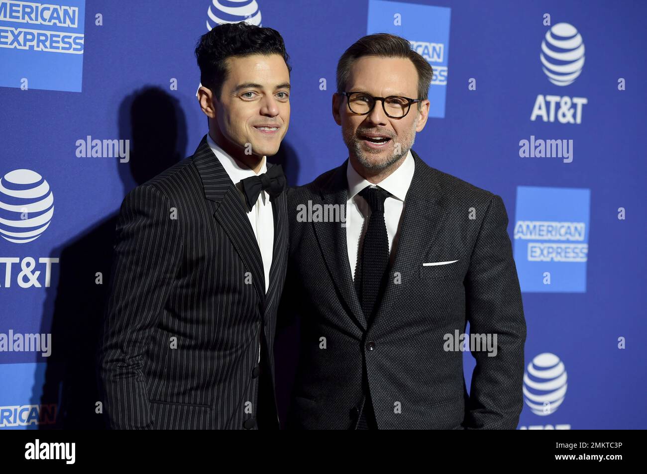 Rami Malek, left, and Christian Slater arrive at the 30th annual Palm ...