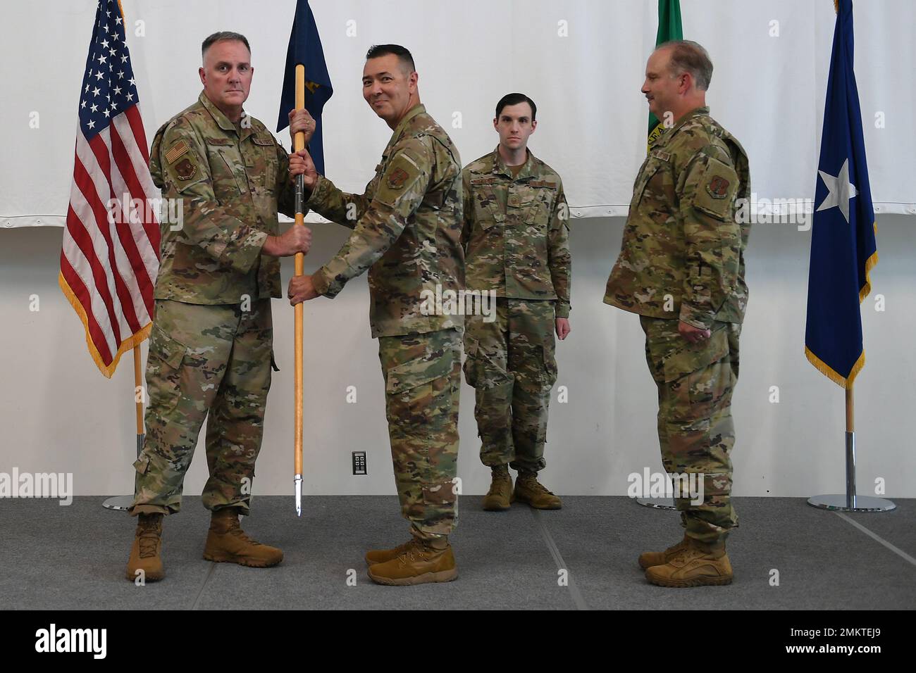 Chief Master Sgt. Allan Lawson accepts the Washington Air National ...