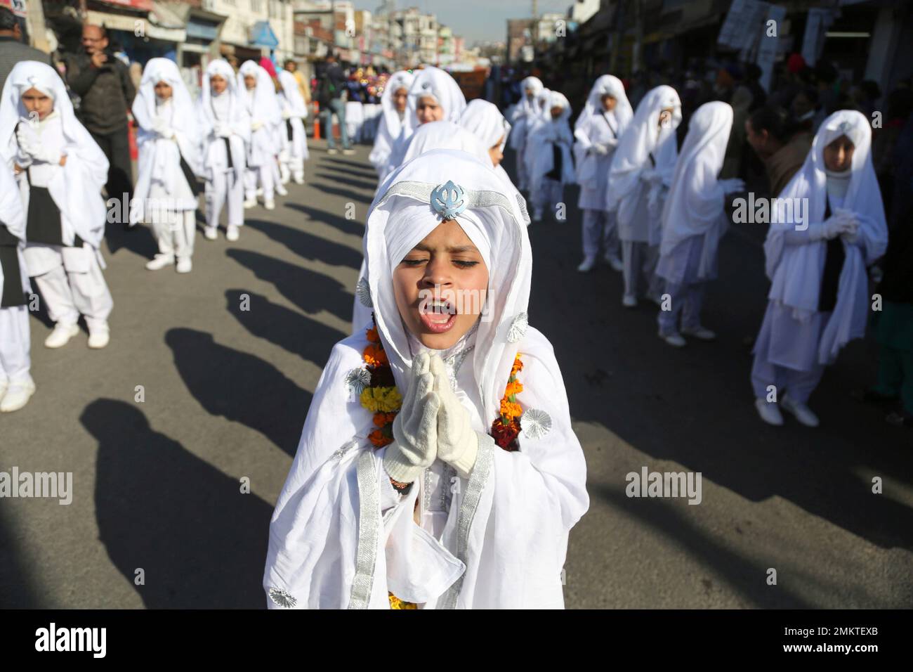 Indian Sikh children participate in a religious procession ahead of the birth anniversary of ...