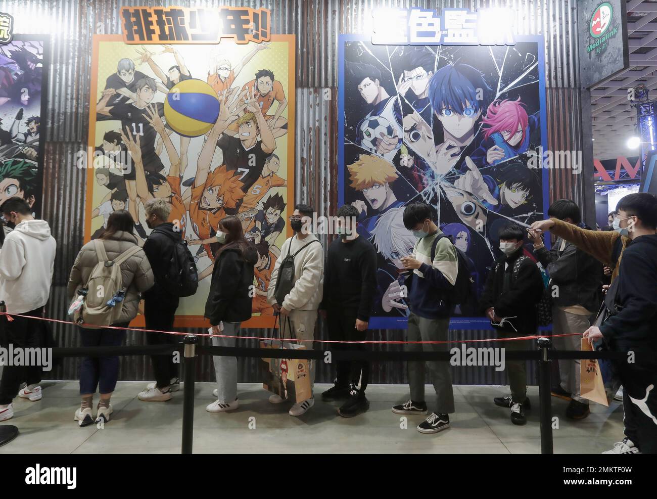 People wearing face masks visit the Comics & Animation Festival in ...