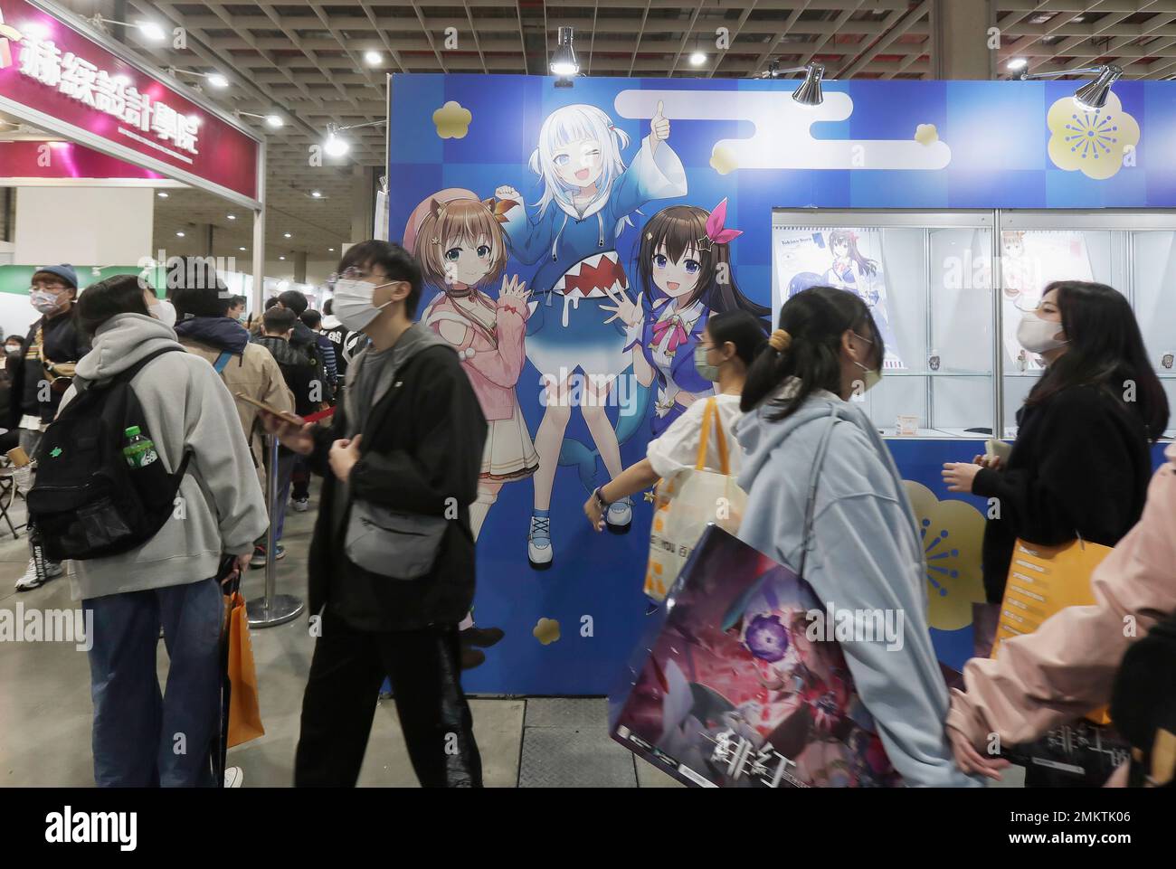 People wearing face masks visit the Comics & Animation Festival in ...