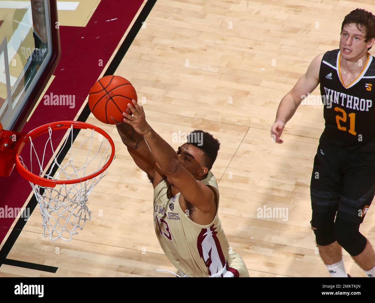 Florida State guard Anthony Polite (13) dunks the ball as Winthrop ...
