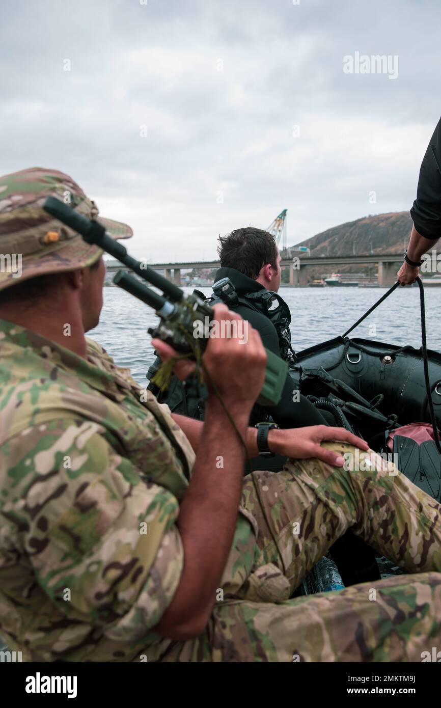 U.S. Navy SEALs assigned to a Naval Special Operations Team, and a ...