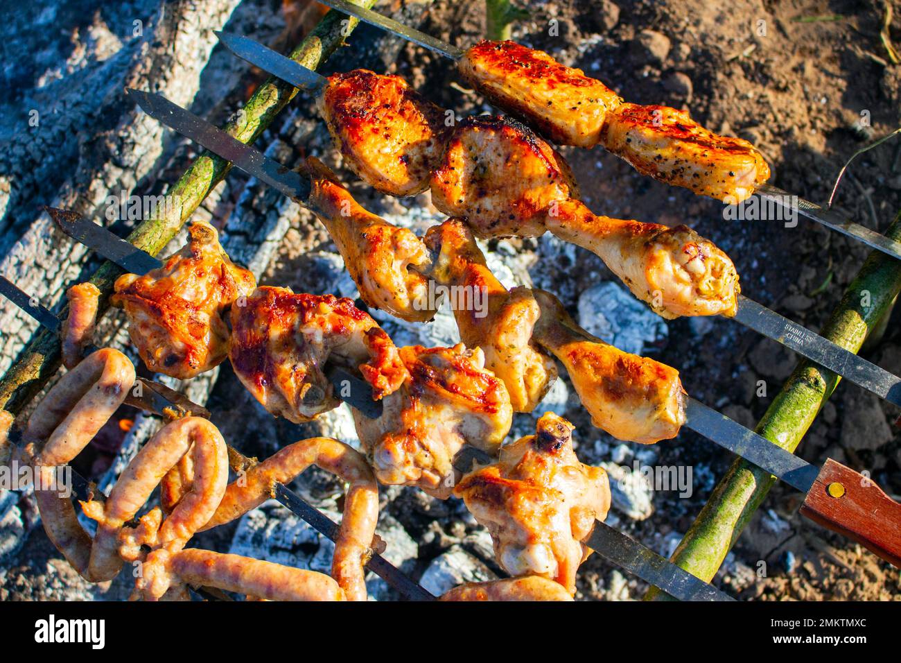 Roasting on grill fried chicken hi-res stock photography and images - Alamy