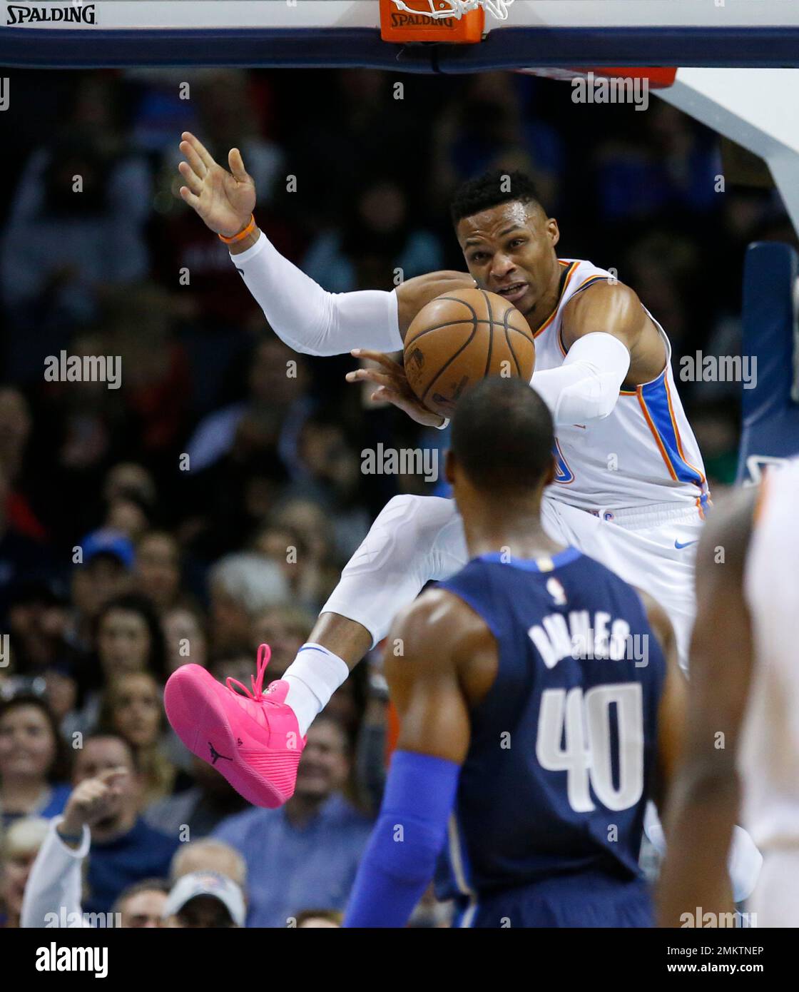 Oklahoma City Thunder guard Russell Westbrook (0) dunks in front of ...