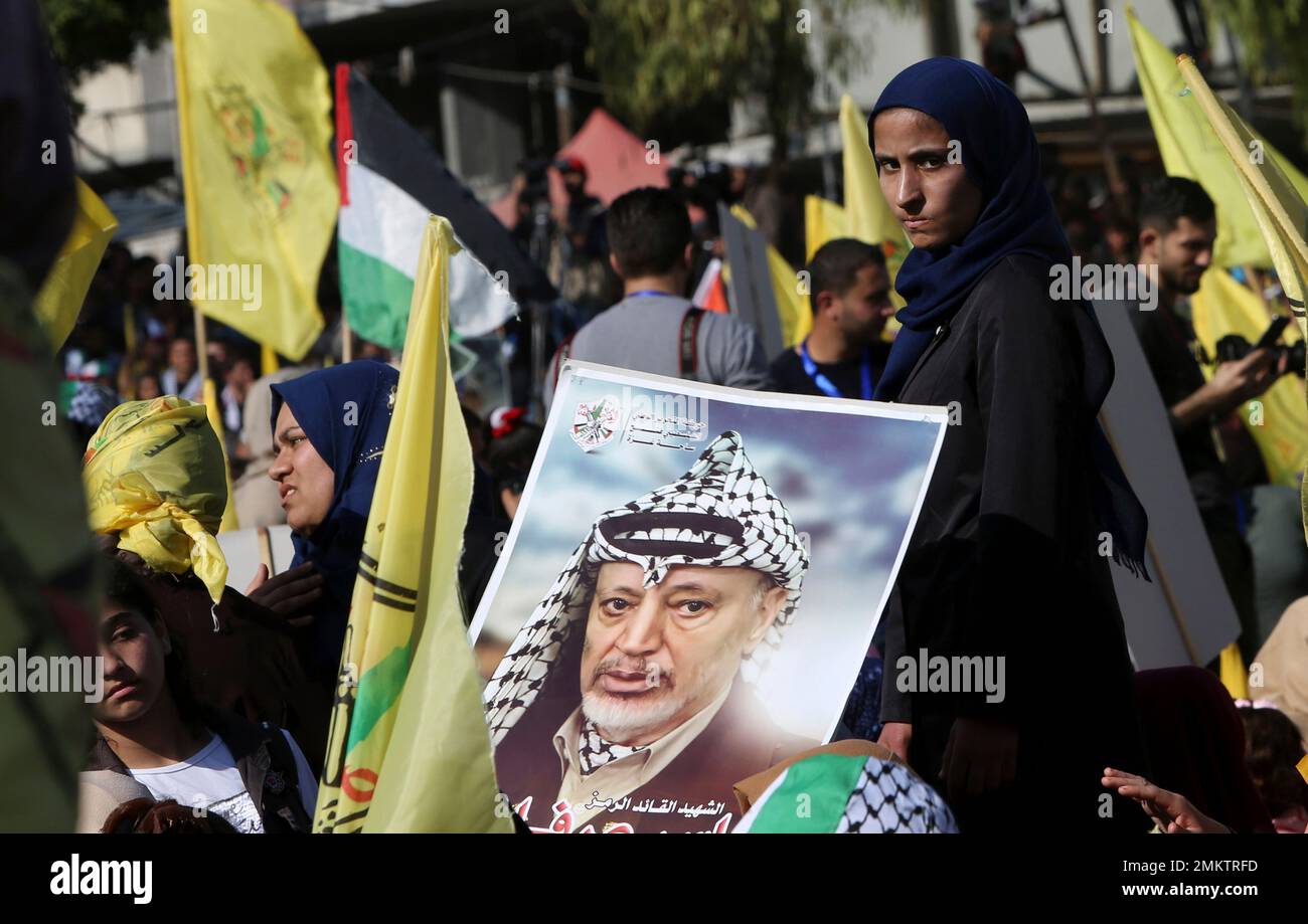FILE - In this Nov. 20, 2018 file photo, Palestinians celebrate while ...