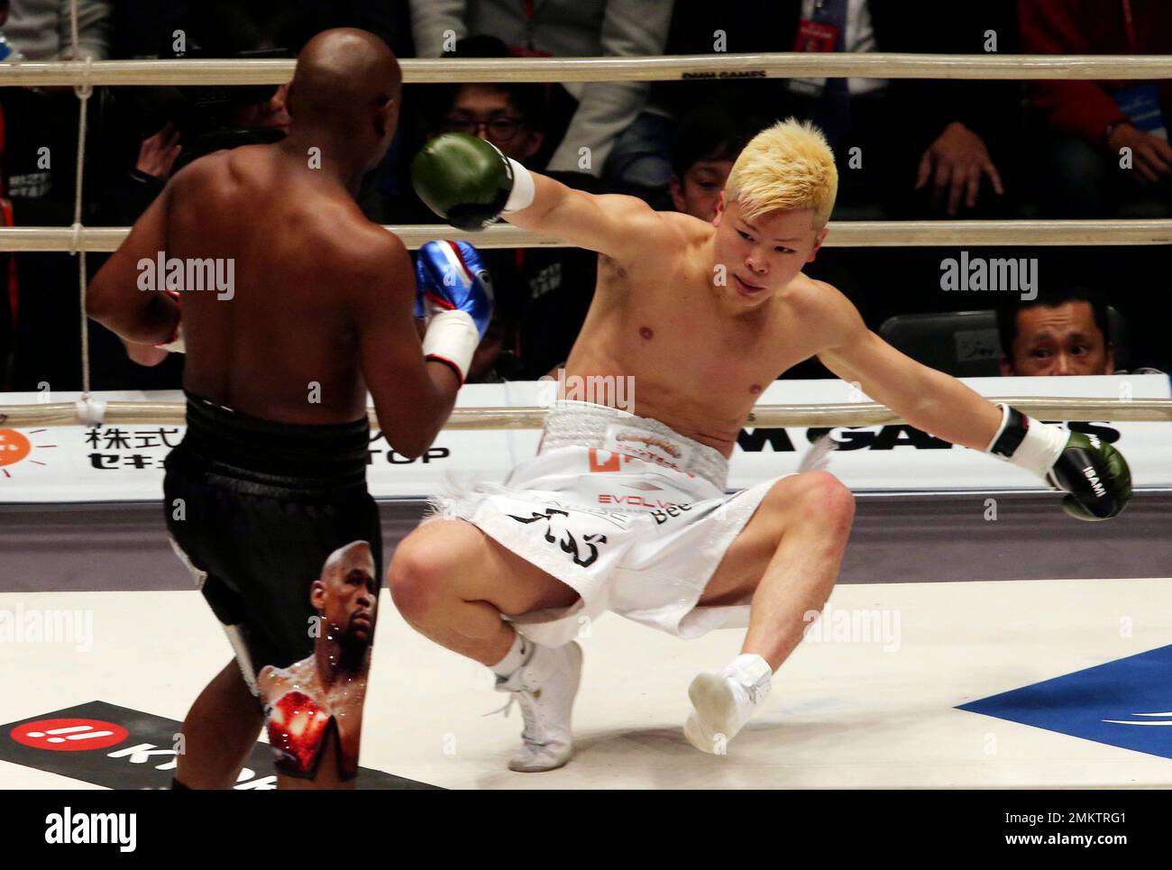 Japanese kickboxer Tenshin Nasukawa lies on the mat after being knocked ...