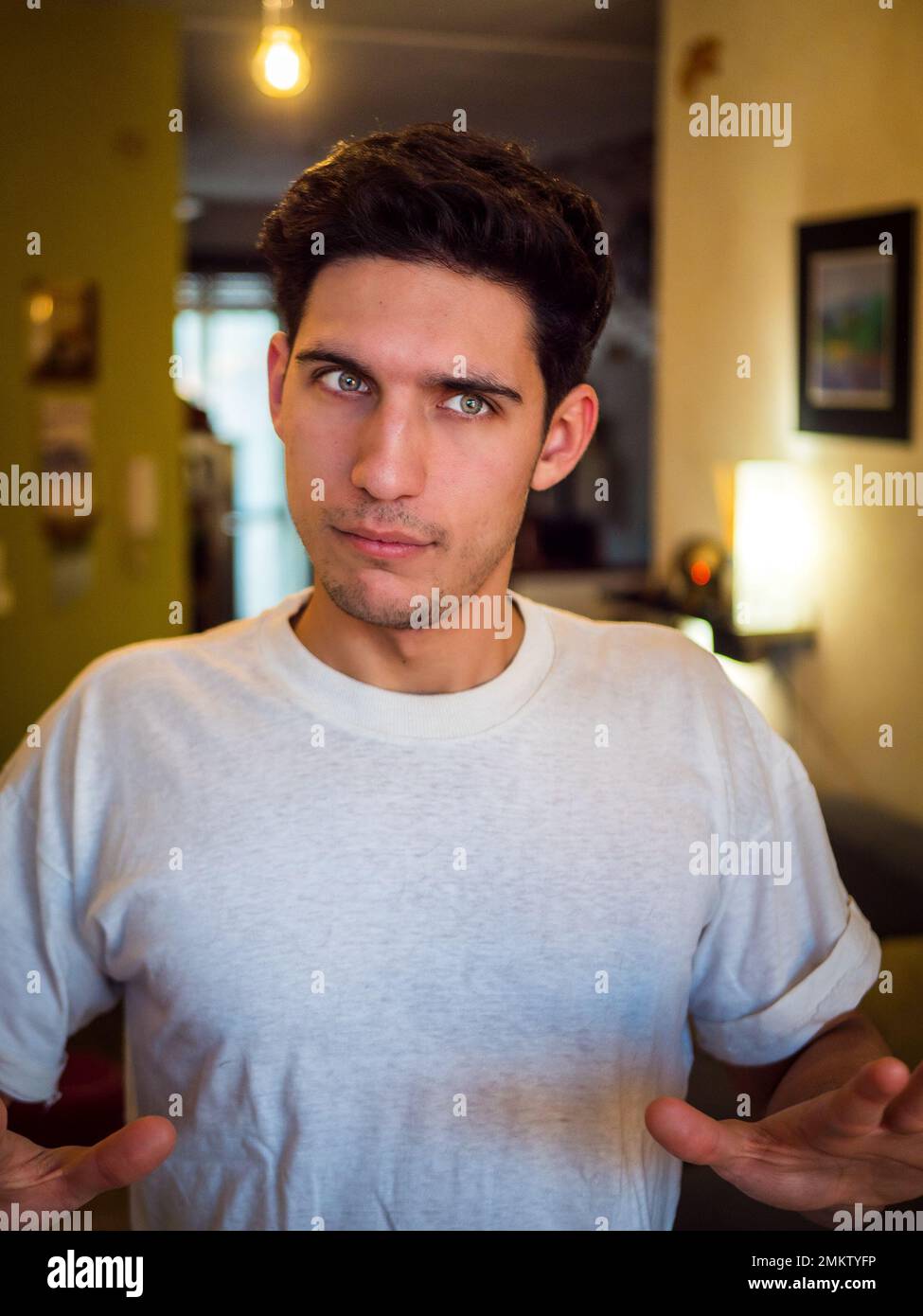 Surprised, scared, frightened, unsure handsome young man Stock Photo ... Surprised, scared, frightened, unsure handsome young man Stock Photo ...