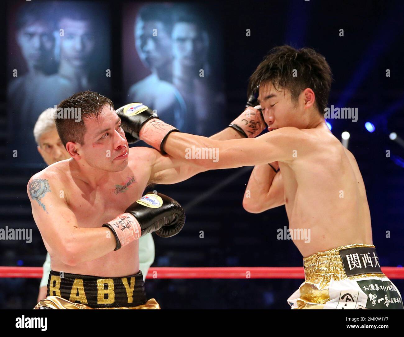 Japanese champion Ken Shiro, right, and Mexican challenger Saul Juarez ...