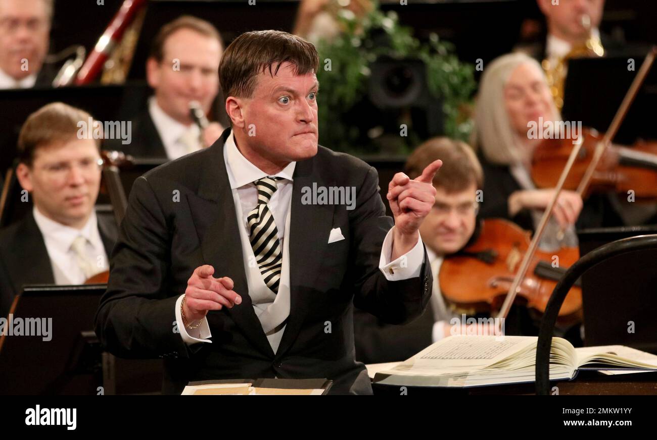 Conductor Christian Thielemann, center, conducts the Vienna ...