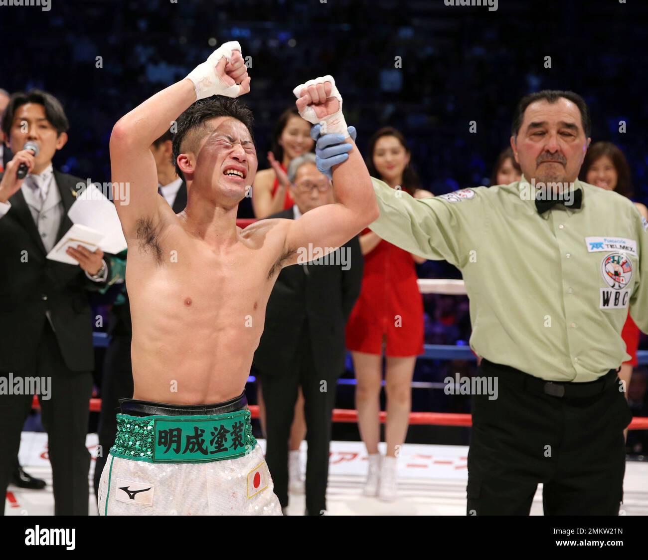 Japan's Takuma Inoue is declared the winner by the referee after ...
