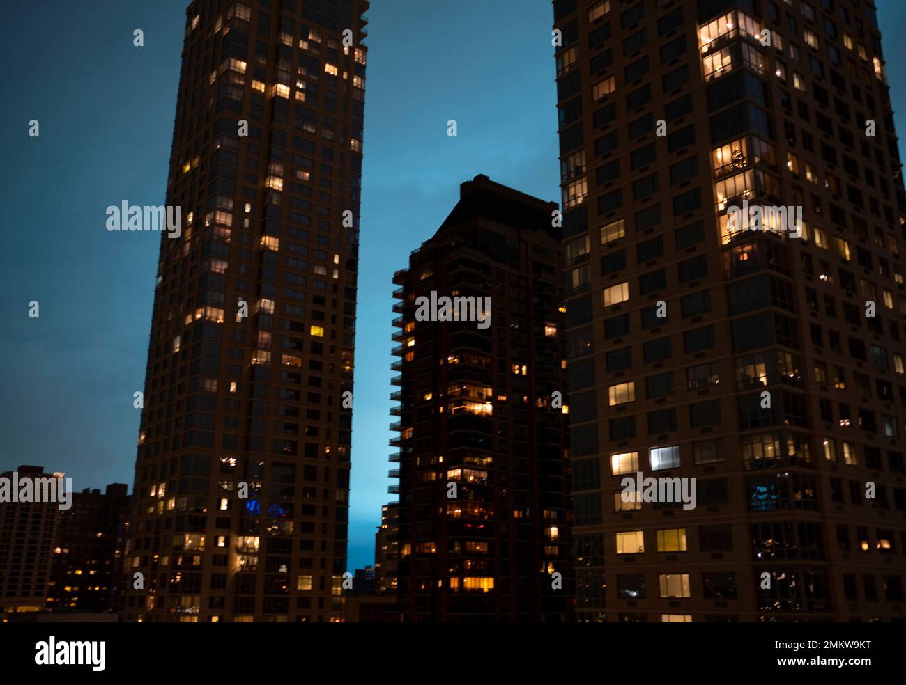 Viewed from the Upper West Side of Manhattan, the night sky is alight ...
