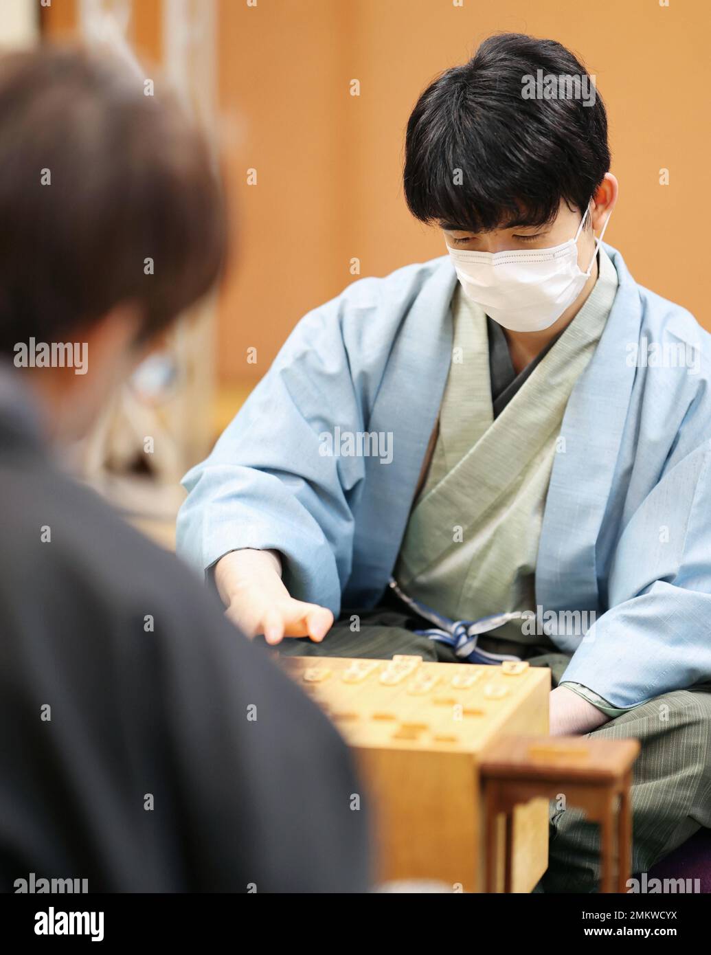 Defending champion Sota Fujii (facing camera) reflects on Game 3 of a historic best-of-seven ...