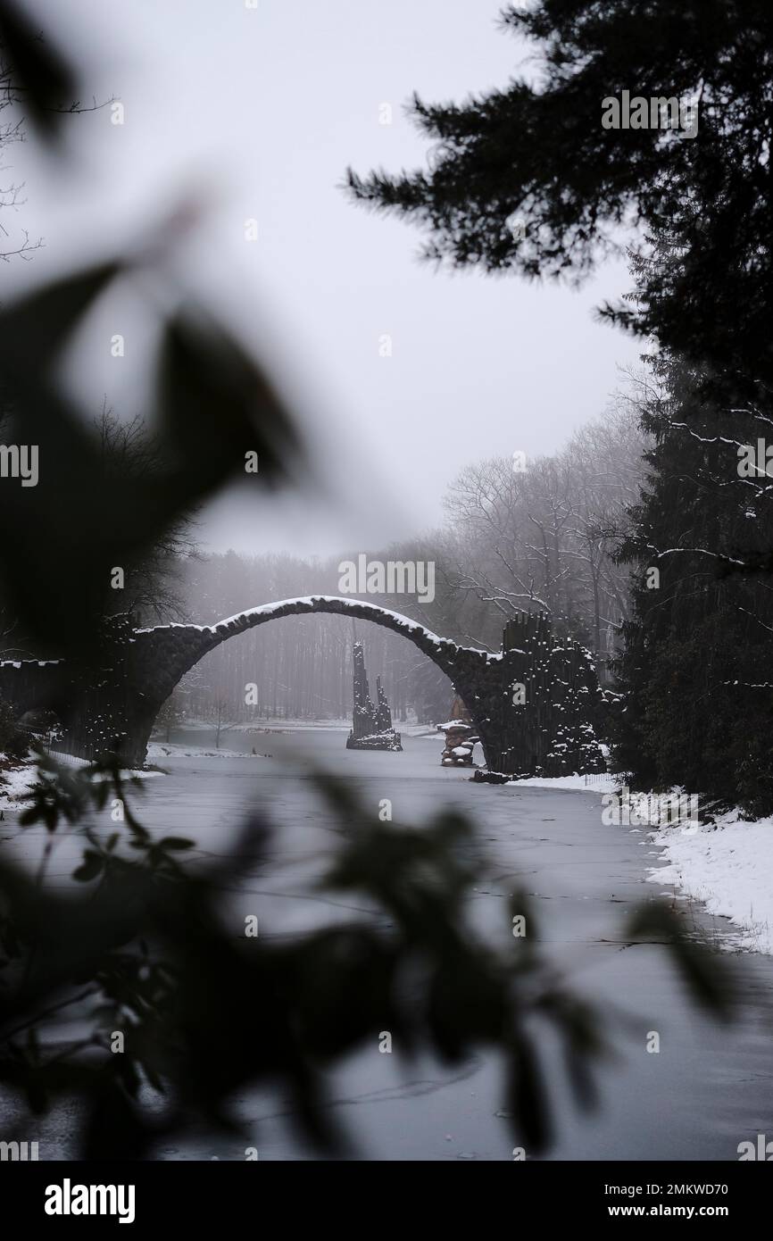 Middle Earth in Winter: An Old Stone Bridge over a Frozen Lake Stock ...