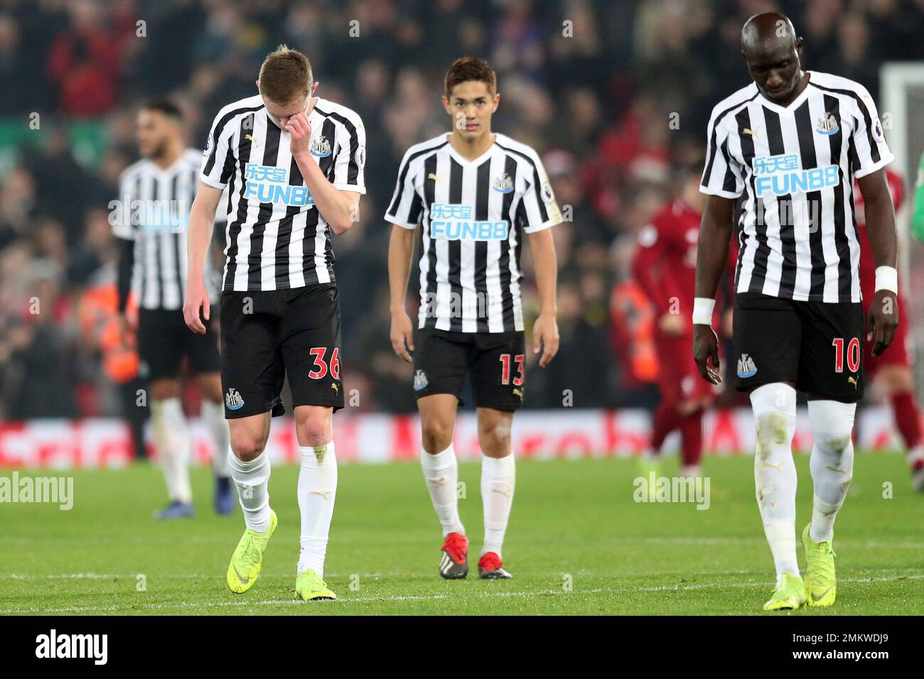 From left, Newcastle's Sean Longstaff, Yoshinori Muto and Mohamed Diame ...