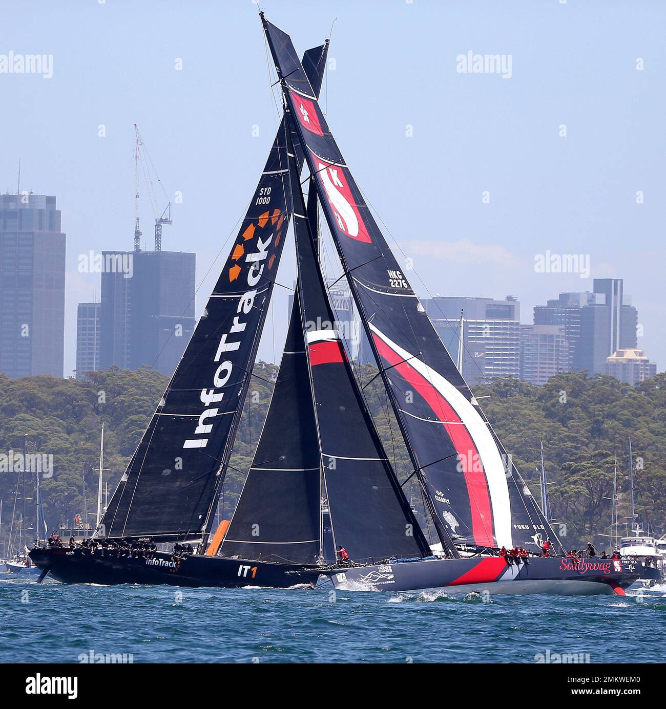 Maxi yachts Scallywag, right, and Infotrack cross during the start of ...