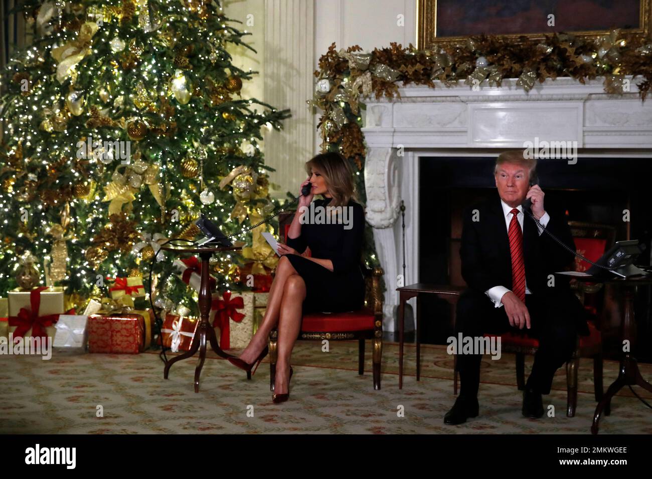 President Donald Trump and first lady Melania Trump speak on the phone ...