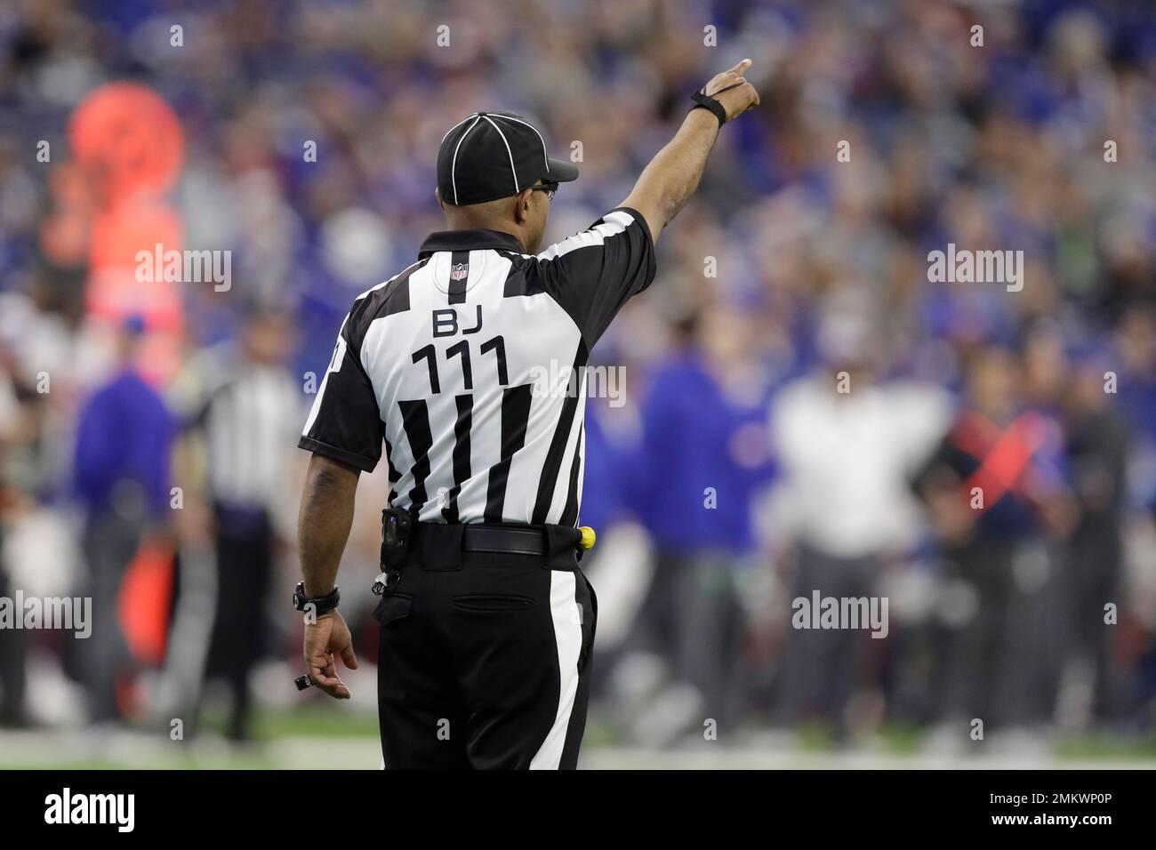 Back judge Terrence Miles (111) signals during the first half of an NFL ...